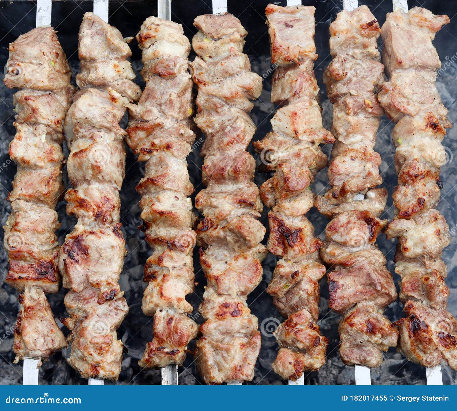 Cooking Meat on Charcoal. the Meat is Put on Skewers and Fried on the ...