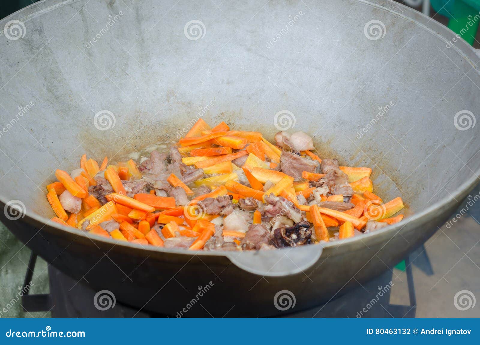 Cooking Meat Outdoors in Cast-iron Cauldron. Stock Photo - Image of ...