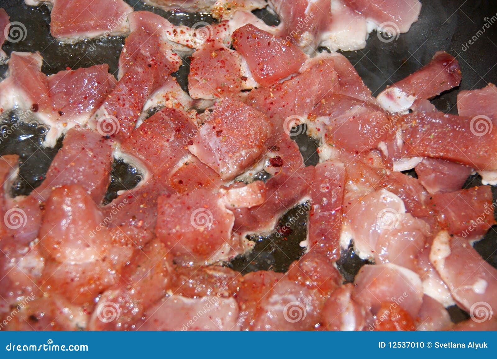 Cooking meat on pan stock photo. Image of meat, food - 12537010