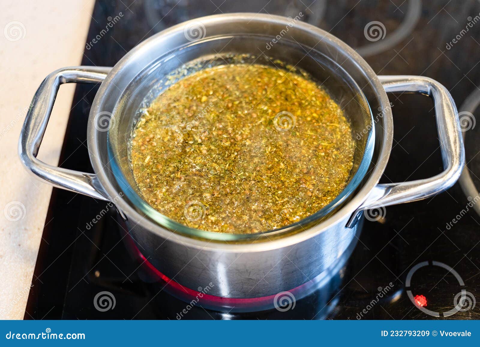 Cooking Medicinal Herbs and Plants in Water Bath Stock Image - Image of ...