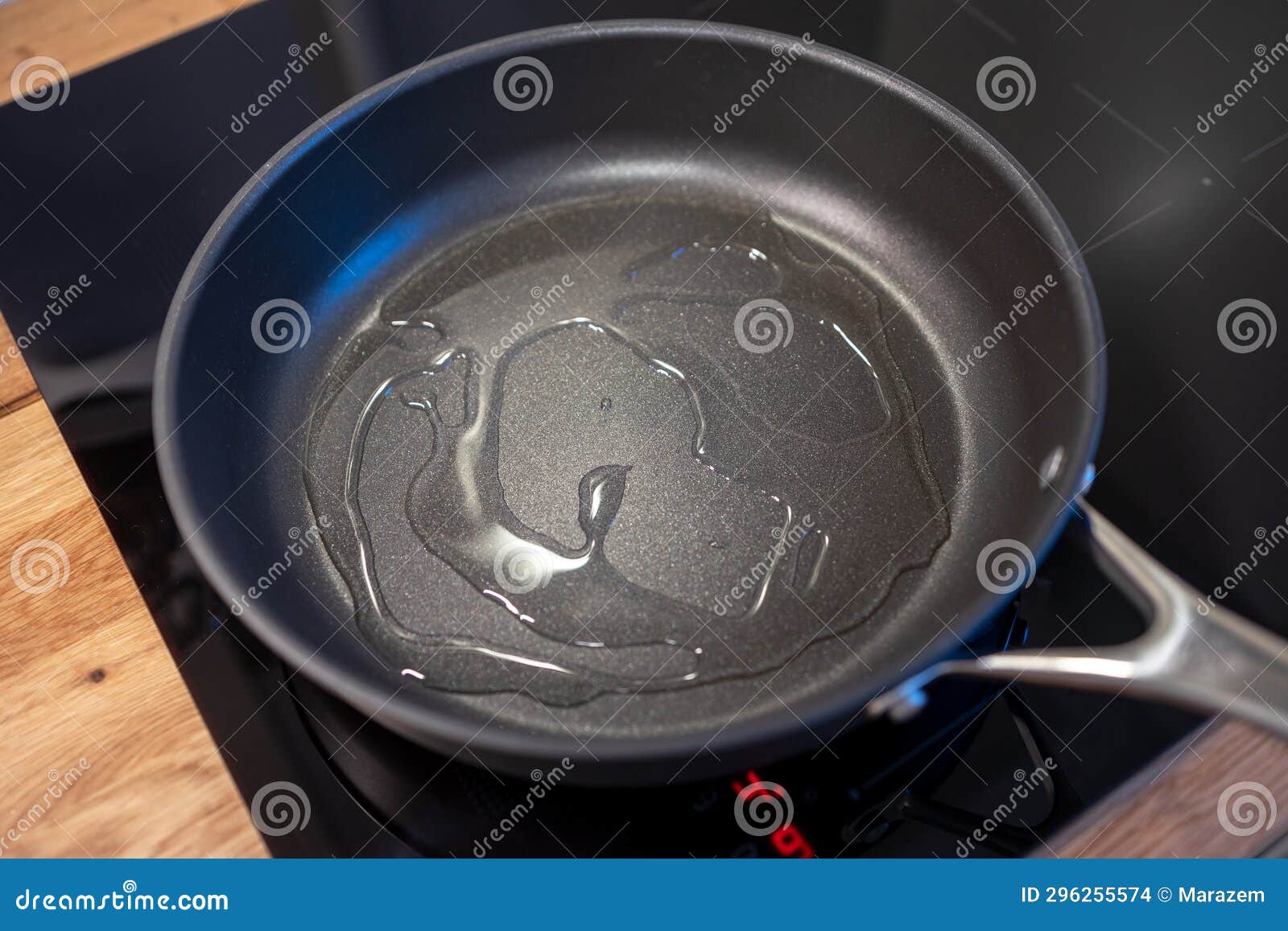Cooking oil on a pan stock photo. Image of closeup, lunch - 296255574