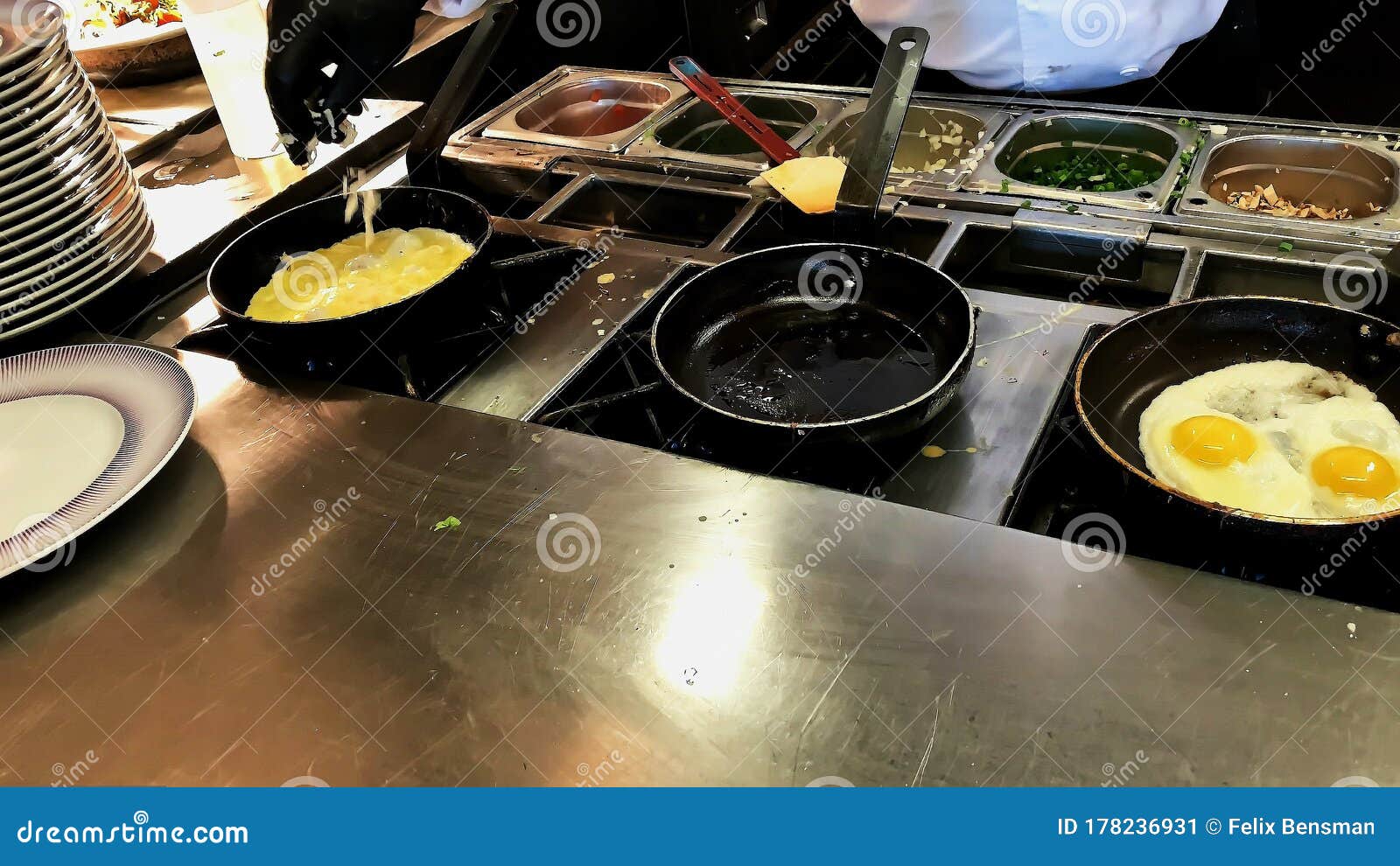 Cooking Omelettes and Fried Eggs. Breakfast Buffet in Restaurant Stock ...