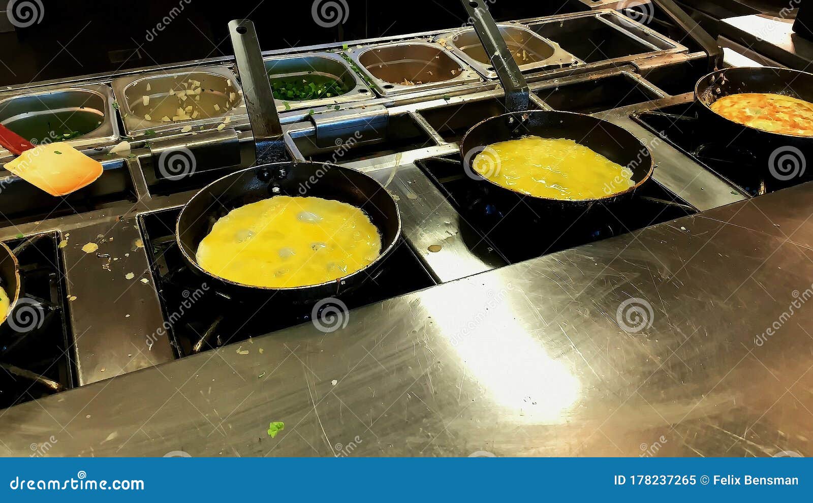 Cooking Omelettes and Fried Eggs. Breakfast Buffet in Restaurant Stock ...