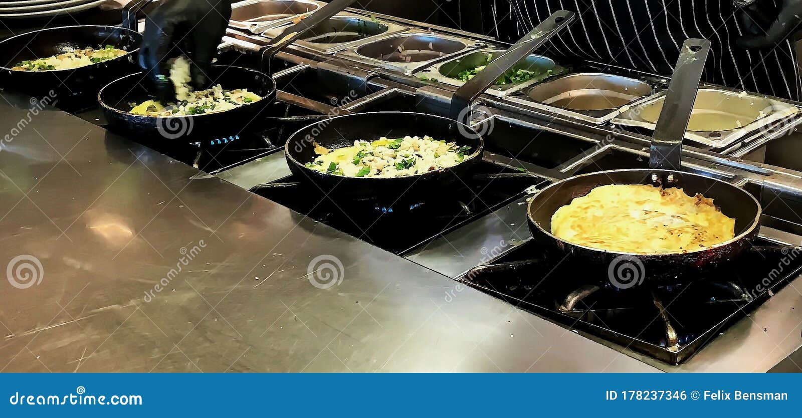 Cooking Omelettes and Fried Eggs. Breakfast Buffet in Restaurant Stock ...