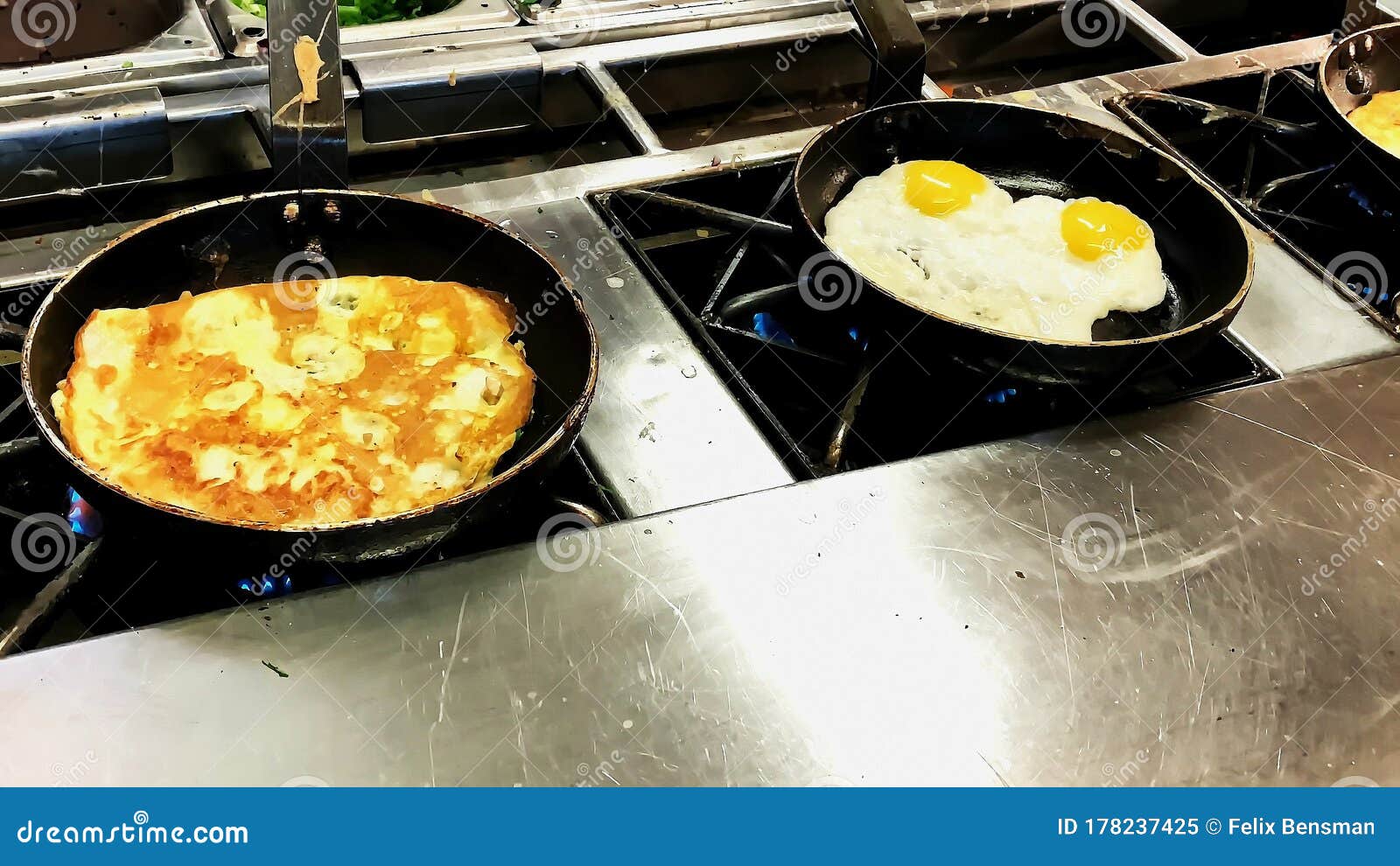 Cooking Omelettes and Fried Eggs. Breakfast Buffet in Restaurant Stock ...