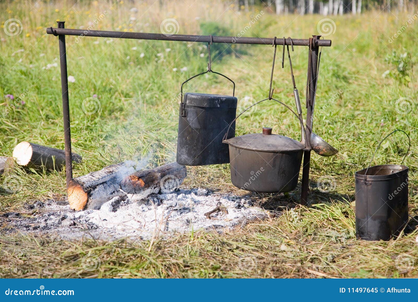 Cooking on an open fire stock image. Image of black, food - 11497645
