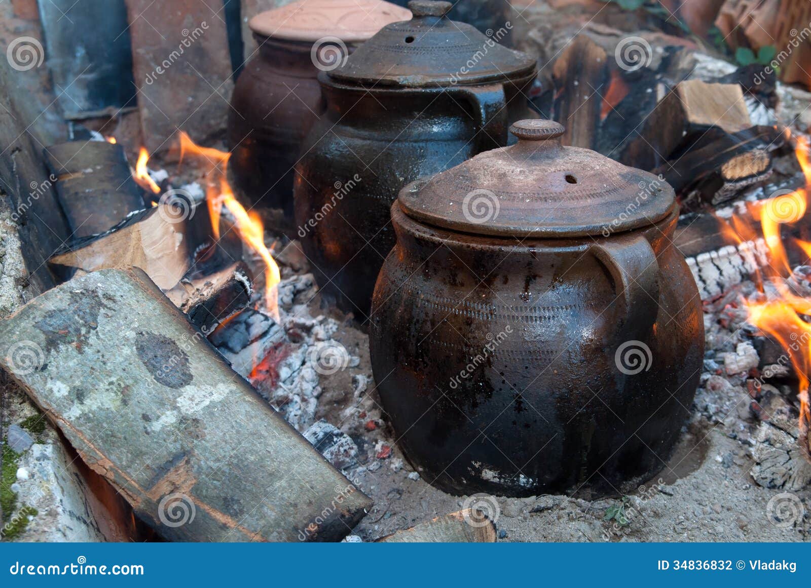 Cooking on an open fire stock photo. Image of food, camping - 34836832