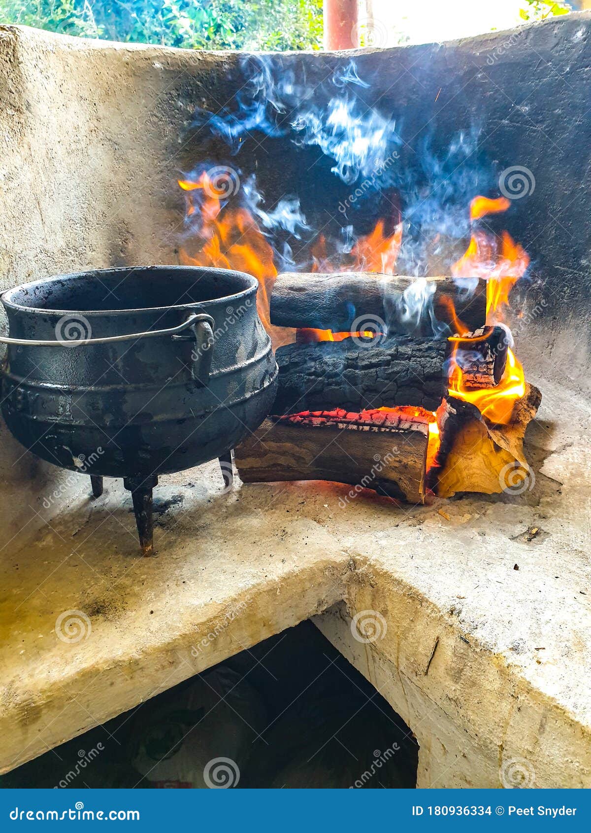 Cooking Over a Fire in a Black Pot Stock Photo - Image of iron ...