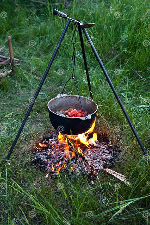 Cooking over an open flame stock image. Image of hang - 9775935