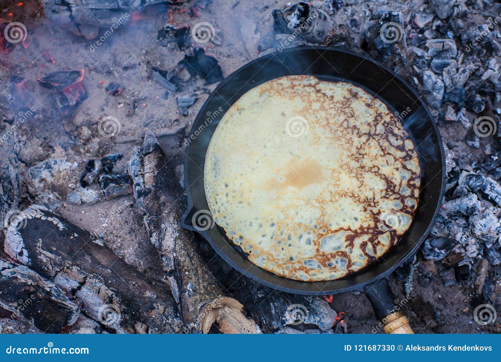 Cooking Pancakes on the Fire in the Forest. Stock Photo - Image of ...