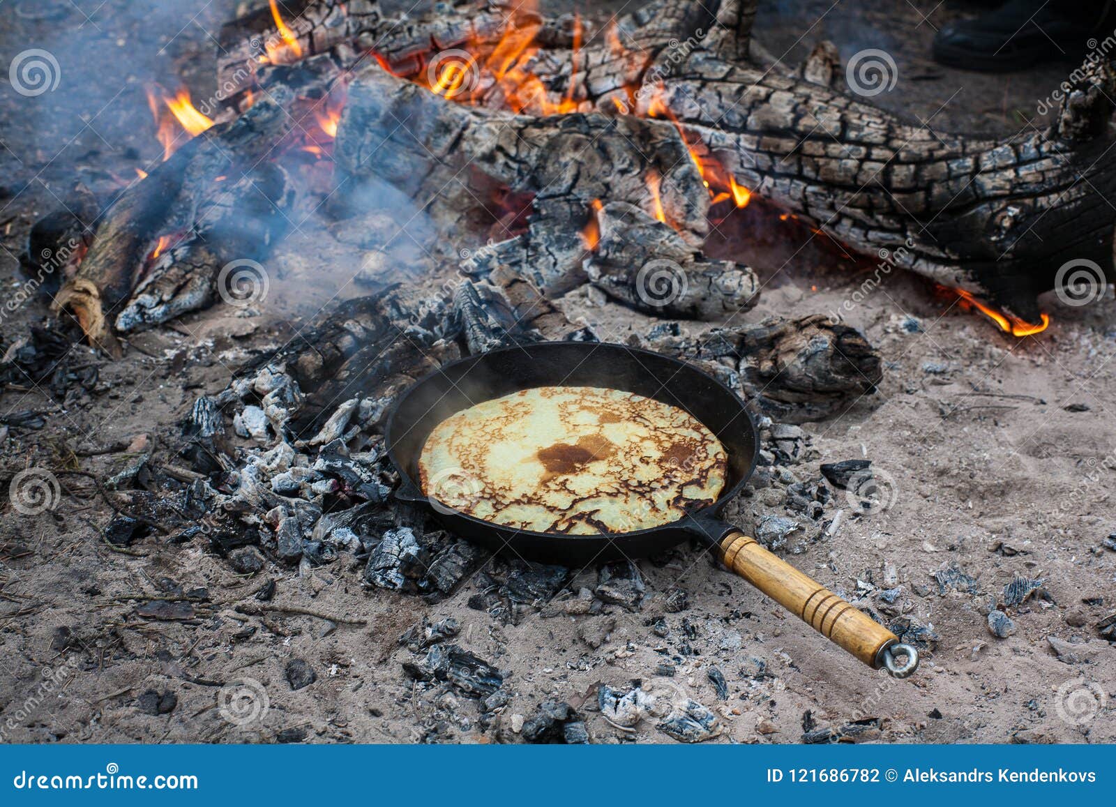 Cooking Pancakes on the Fire in the Forest. Stock Photo - Image of ...