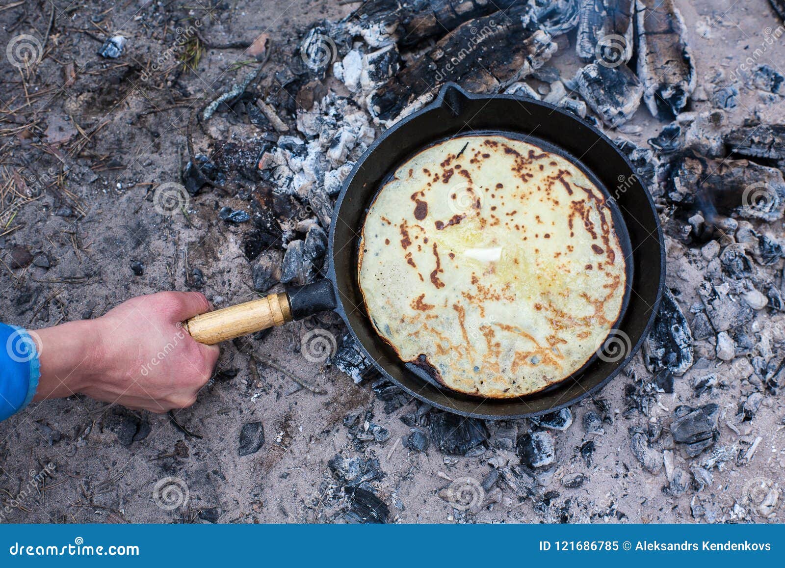 Cooking Pancakes on the Fire in the Forest. Stock Image - Image of ...