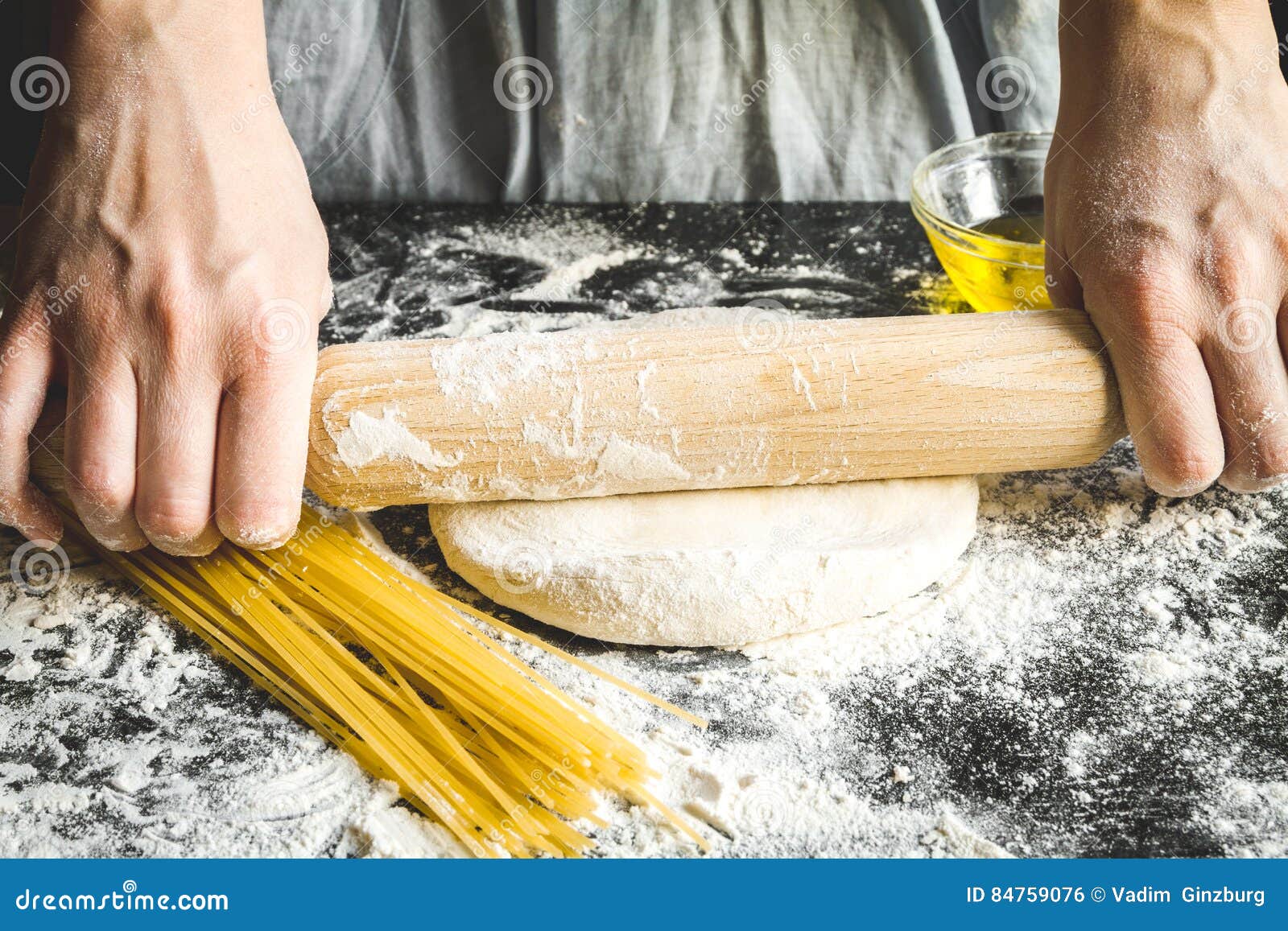 Cooking Pasta by Chef in Kitchen on Dark Background Stock Photo - Image ...