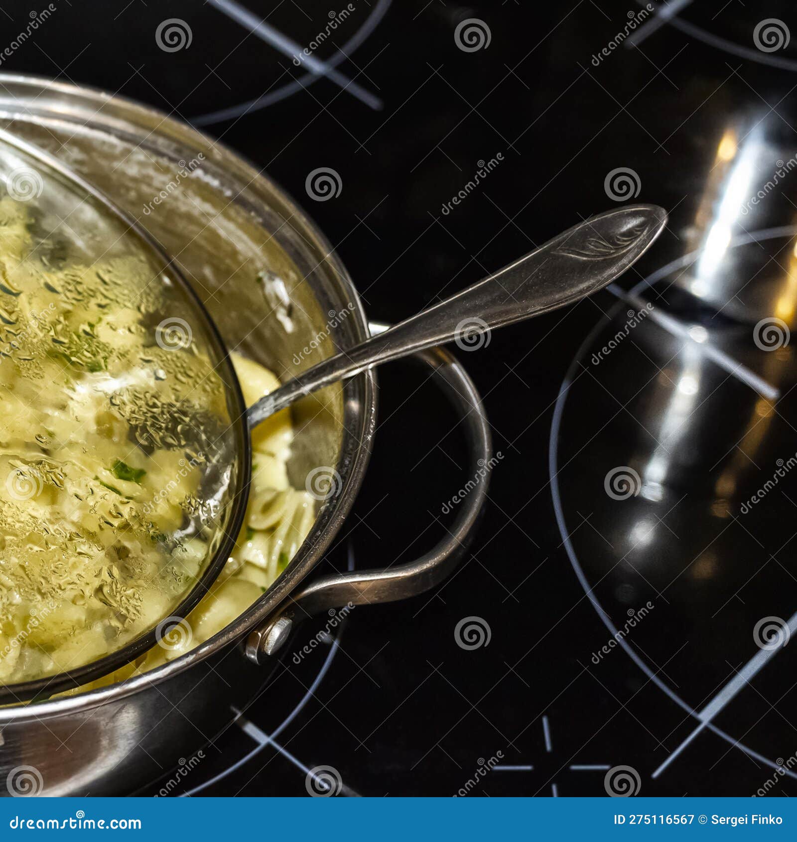 Cooking pasta in a pan stock image. Image of meal, culinary - 275116567