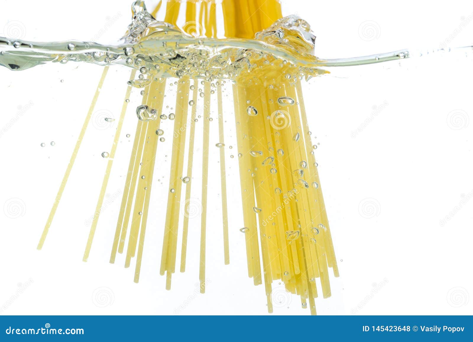 Cooking Pasta Spaghetti Falling Into Boiling Water And Splash On White ...