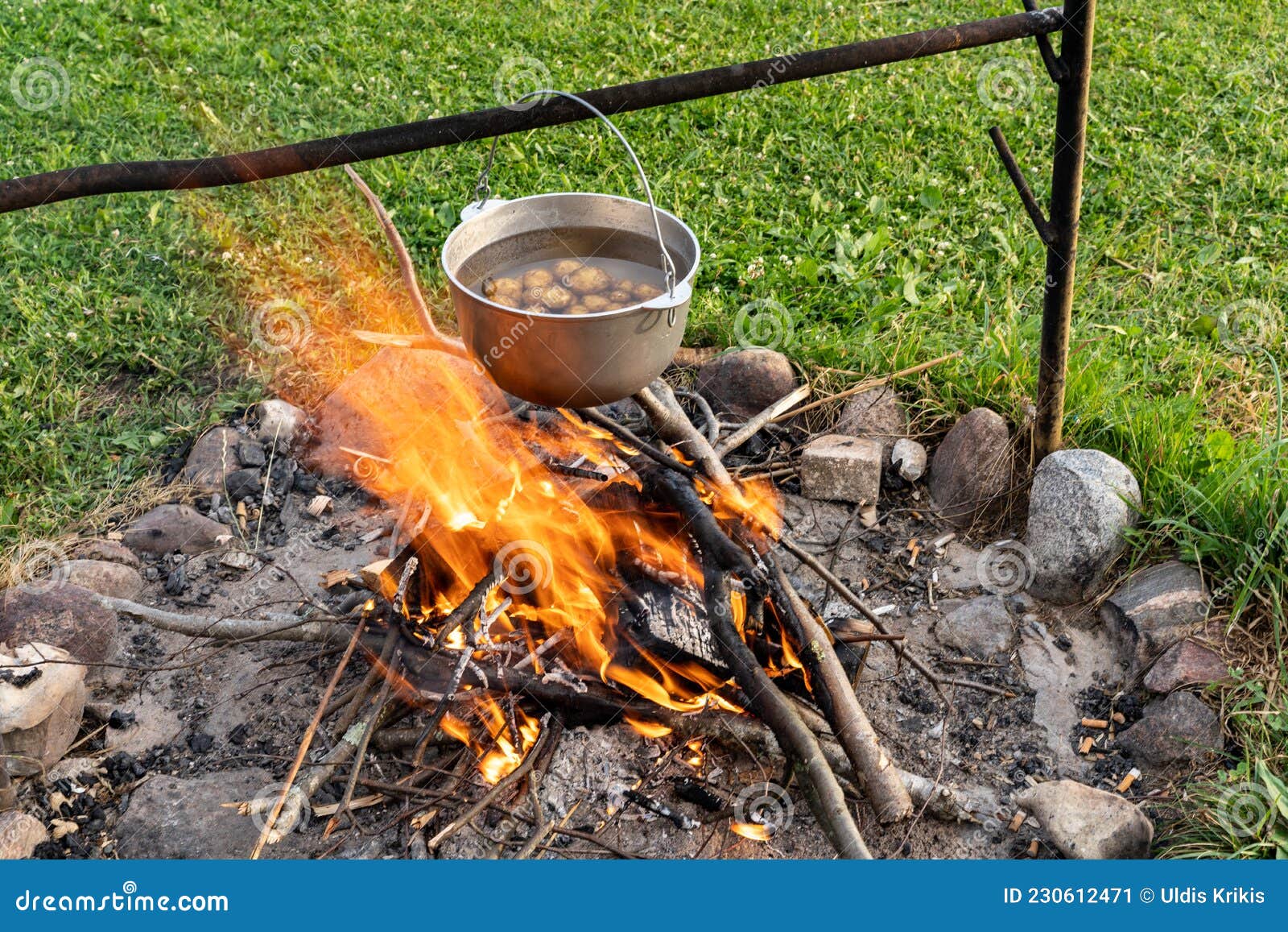 Boiling patatos on fire stock image. Image of fire, fireplace - 230612471