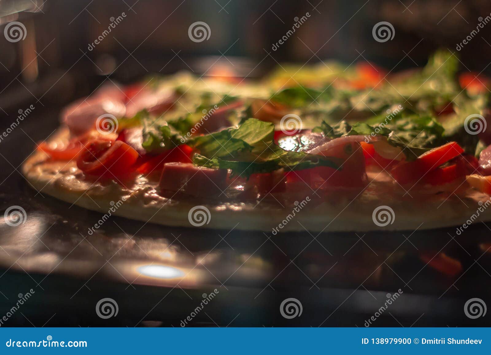 Cooking Pizza in Hot Air Oven, Soft Focus Stock Photo - Image of glass ...