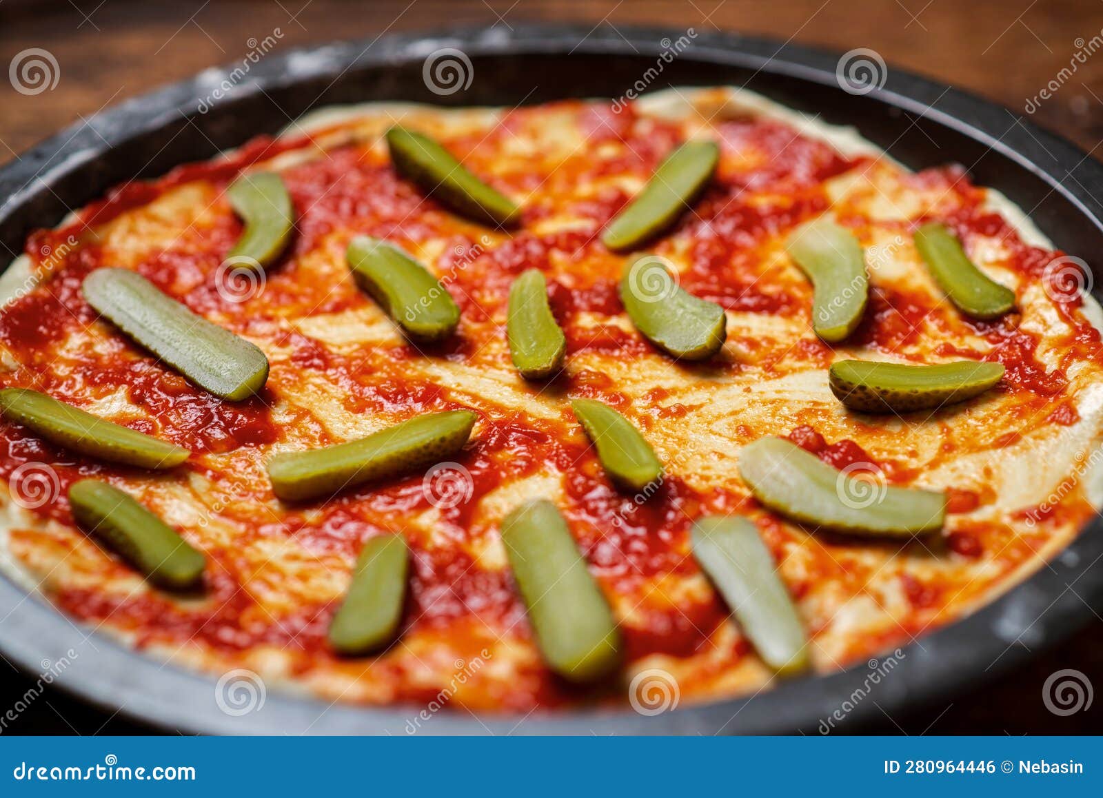 Cooking Pizza with Pickled Cucumbers. Dough Smeared with Tomato Sauce ...