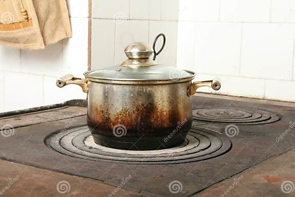 Cooking Pot on Old Kitchen Stove Stock Photo - Image of stove, crockery ...