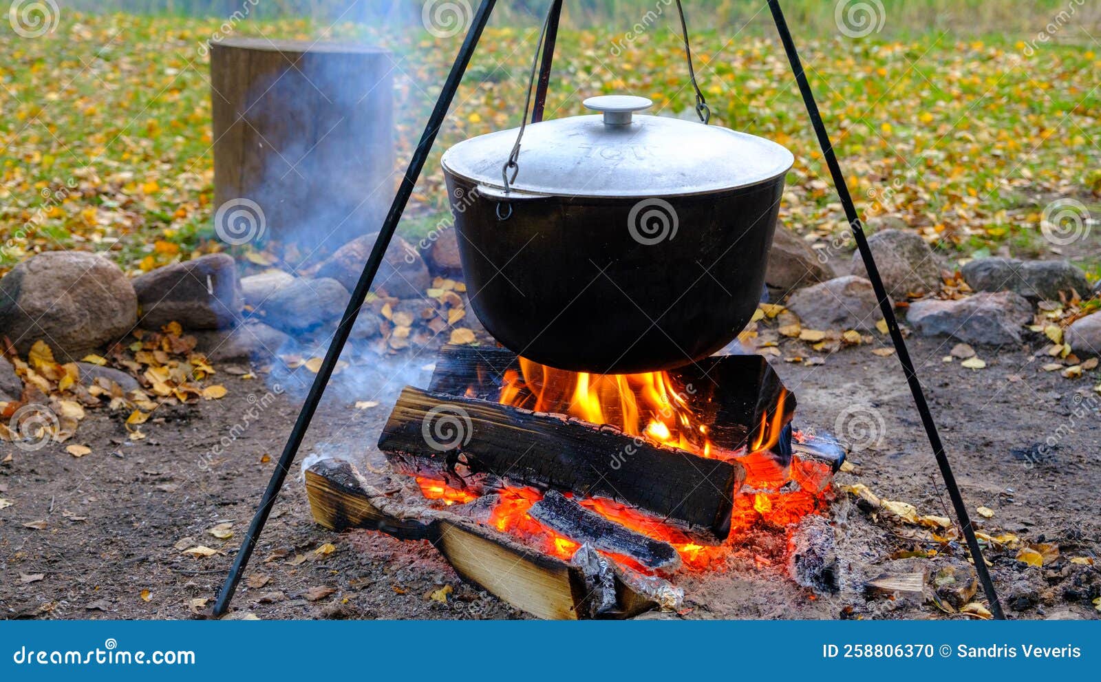 Cooking in a Pot on an Open Fire in Nature. Bowler on a Bonfire in the ...