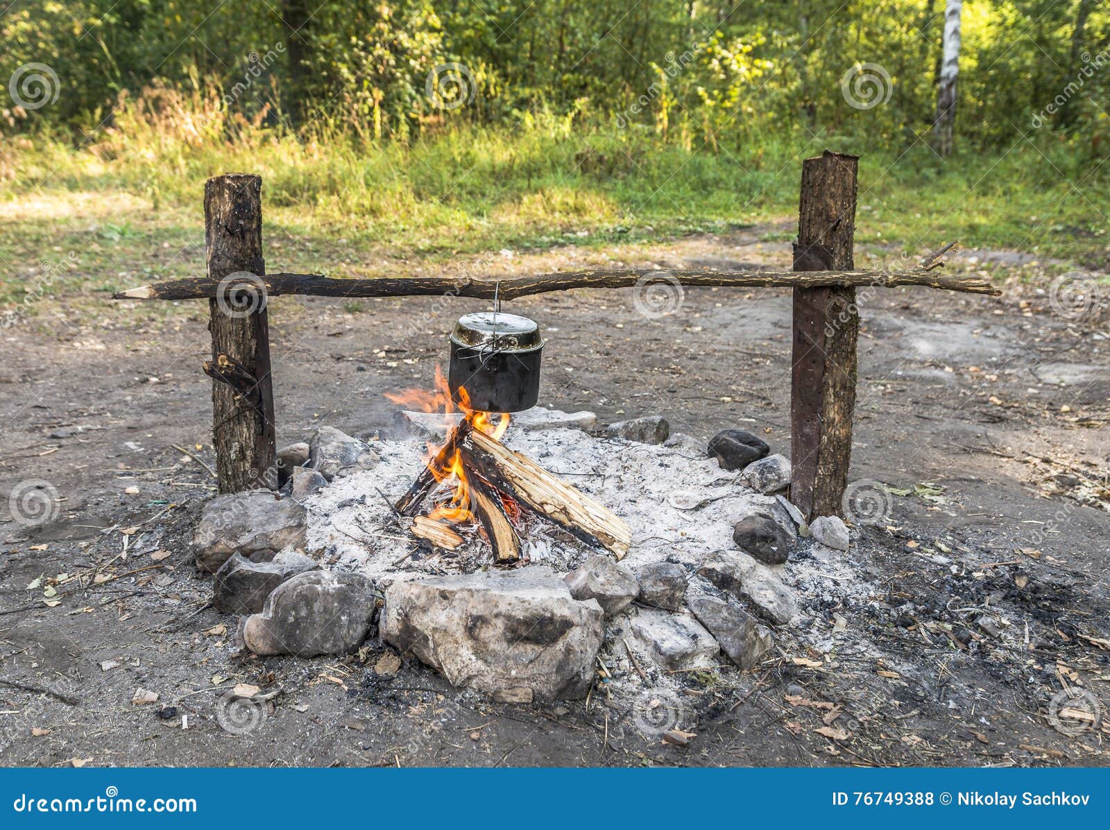 Cooking in a Pot Over the Fire. Stock Photo - Image of holiday, light ...