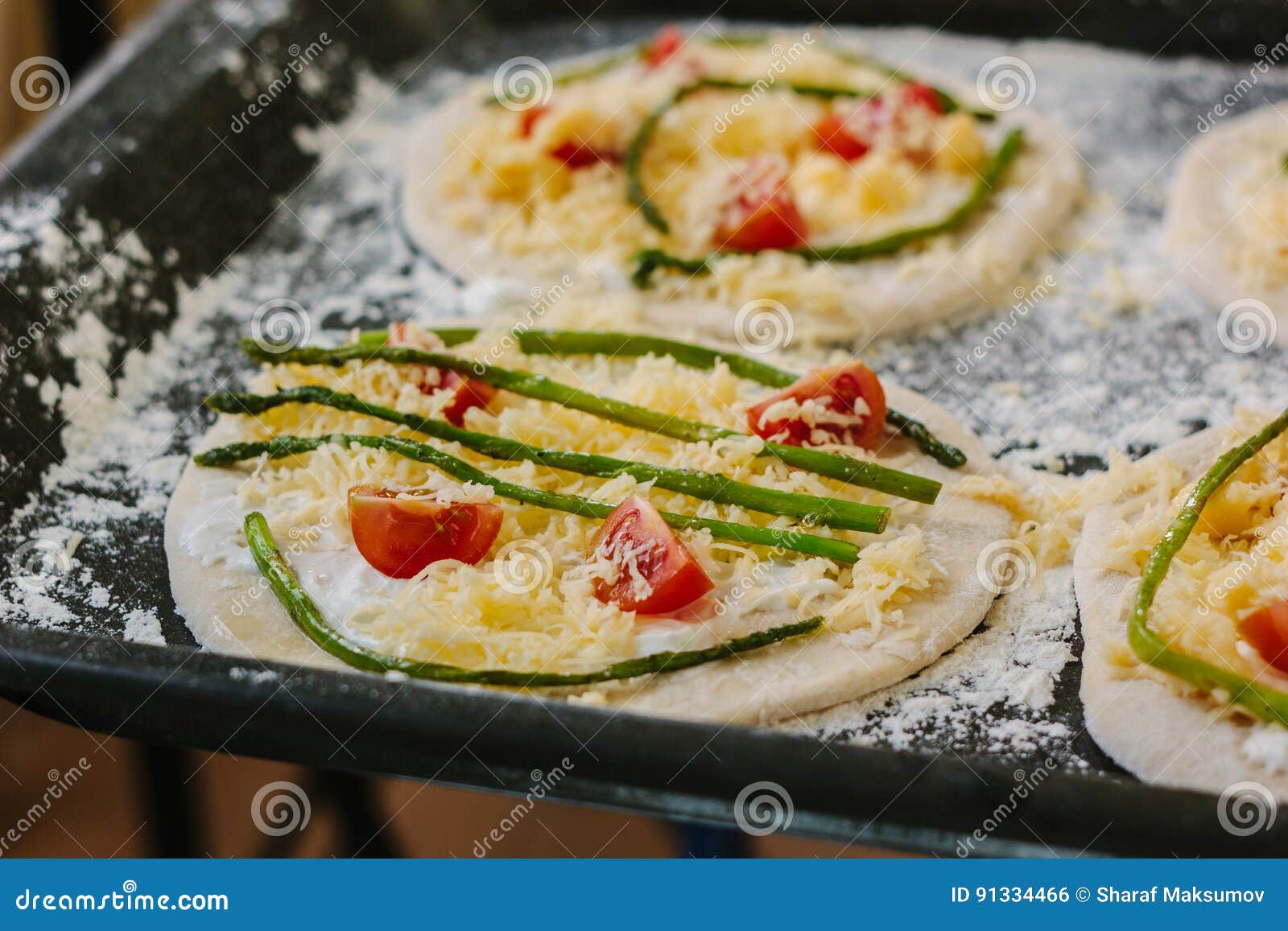 Cooking Process of Making Mini Pizza - Small and Personal, with Cheese ...