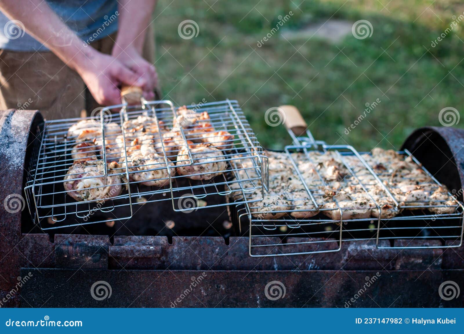 Cooking Raw Meat in a Grid on the Barbeque Grill Stock Photo - Image of ...