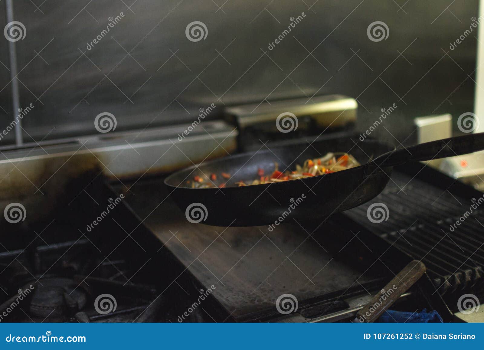 Cooking in a Restaurant Onion and Red Pepper. Stock Photo - Image of ...