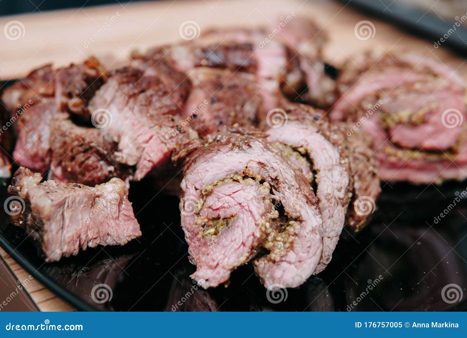 Cooking Ribeye Steaks and Meat Rolls in the Cooking Class. Sliced Meat ...