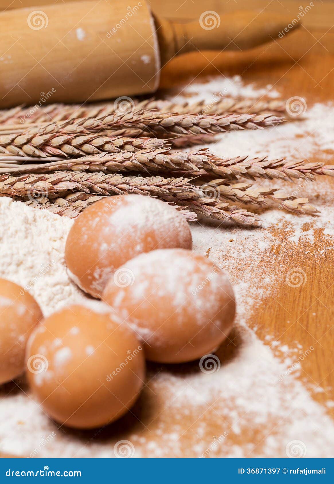 Cooking. Rolling Pin and Eggs in the Flour Stock Image - Image of baked ...