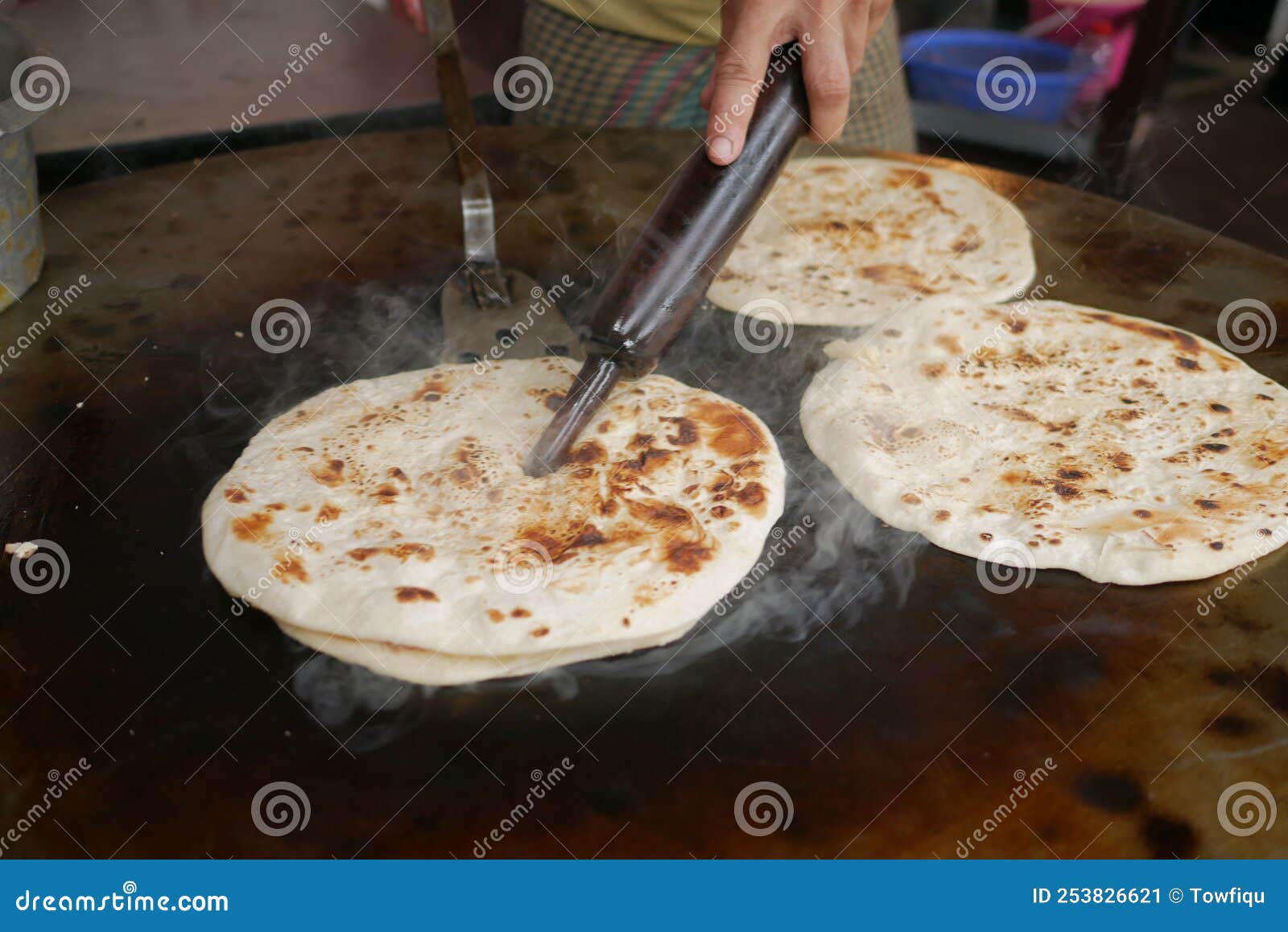 Cooking Roti Chapati on a Big Cooking Pan Stock Image - Image of ...