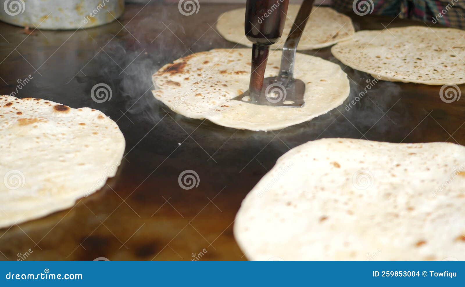 Cooking Roti Chapati on a Big Cooking Pan Stock Footage - Video of ...