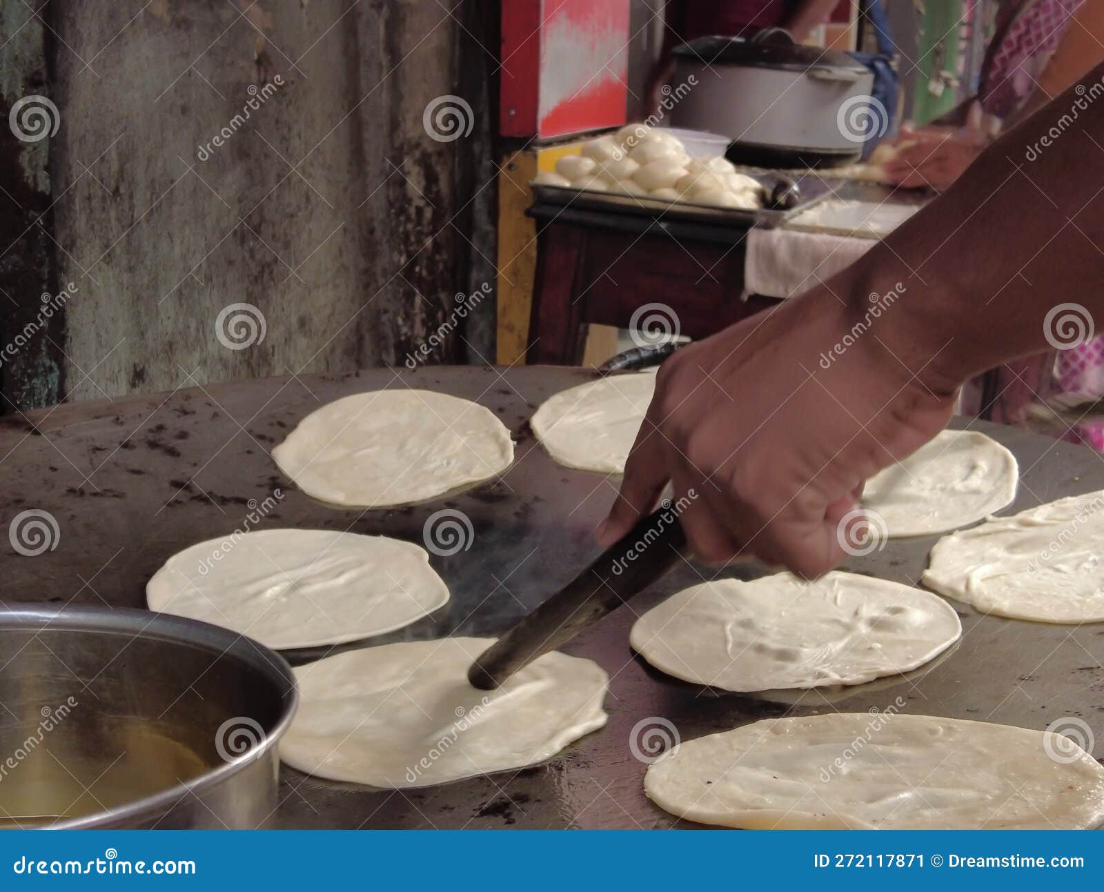 Cooking Roti Chapati on a Big Cooking Pan Stock Image - Image of ...