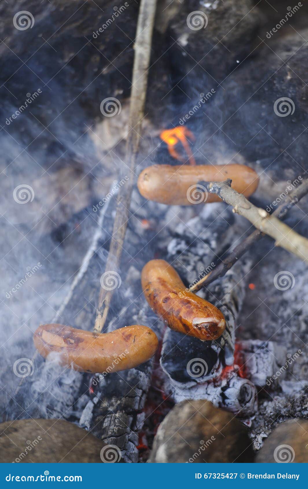 Cooking Sausages Over Camp Fire Stock Image - Image of people, hobbies ...