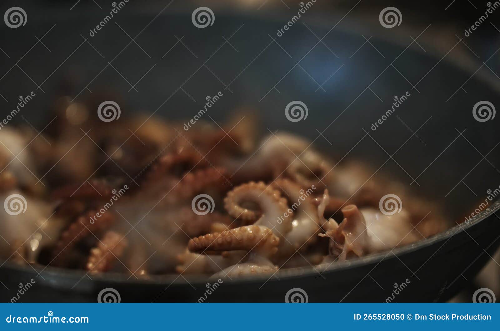 Cooking small octopuses stock photo. Image of cooked - 265528050