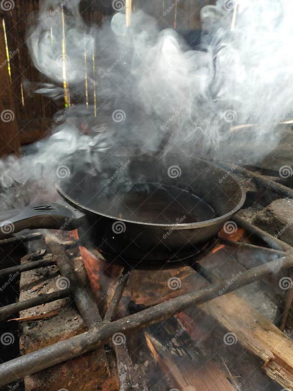 Cooking in smoke stock photo. Image of firebox, firewood - 285978060