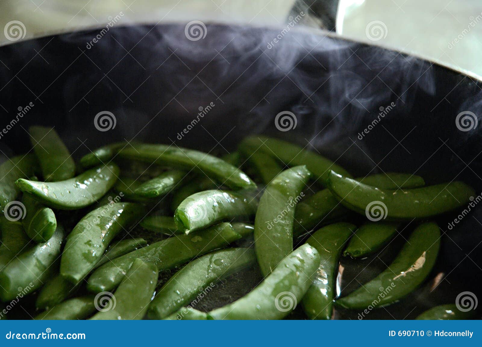 Cooking snap peas stock photo. Image of dine, steam, peas - 690710