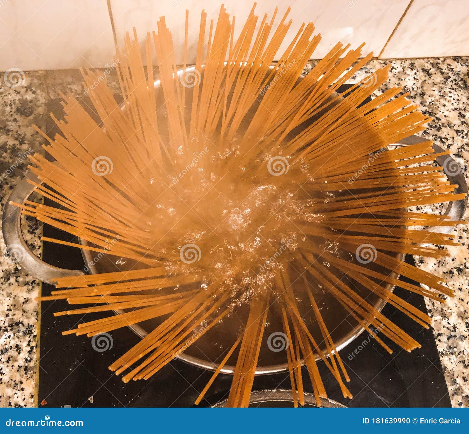 Cooking spaghetti in a pot stock photo. Image of cooked - 181639990