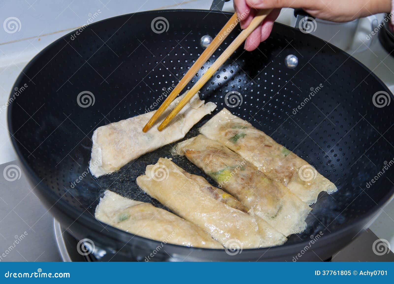 Cooking spring rolls stock image. Image of orient, homemade - 37761805