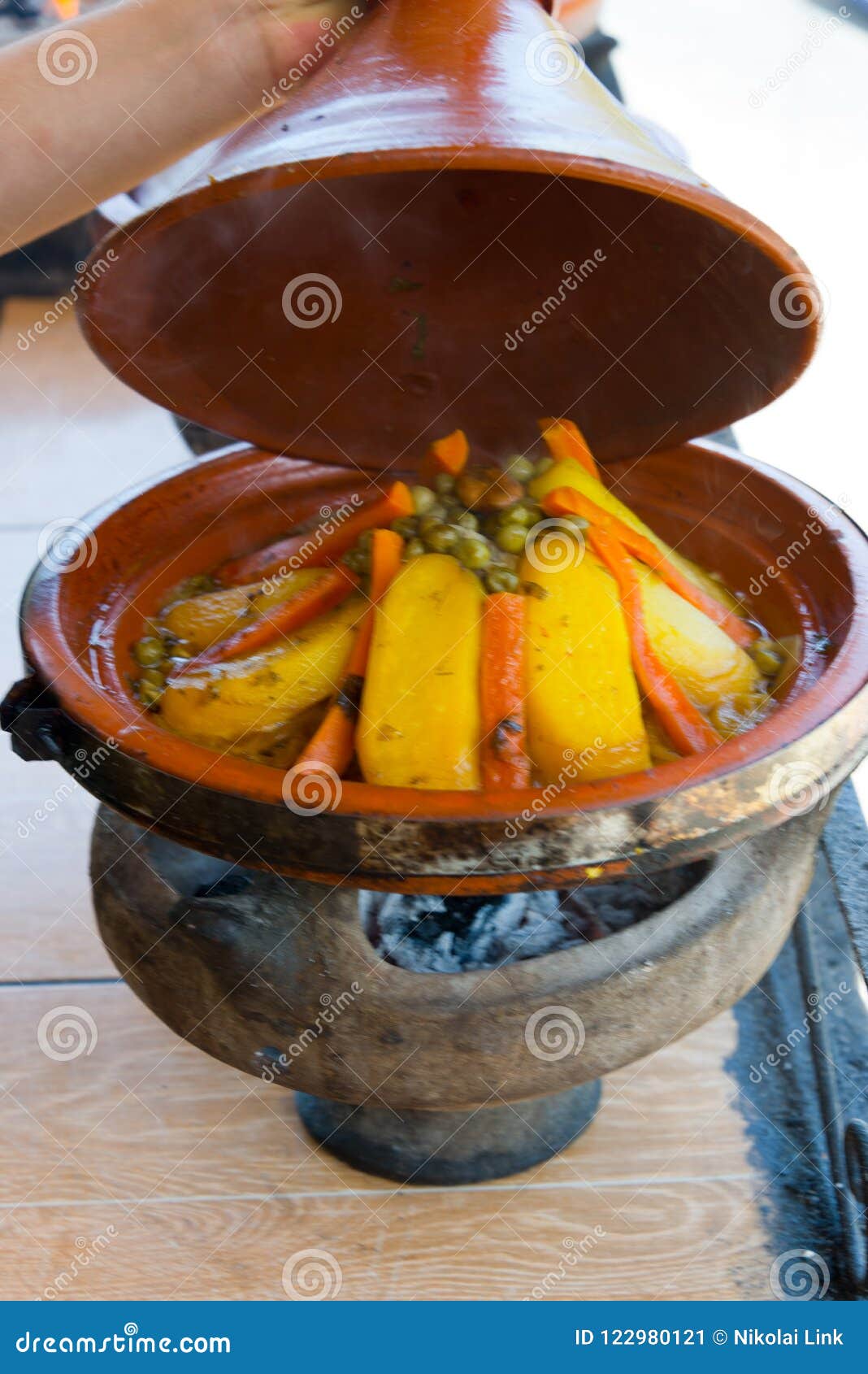 Cooking in Traditional Moroccan Tajine Pot Stock Image - Image of meat ...