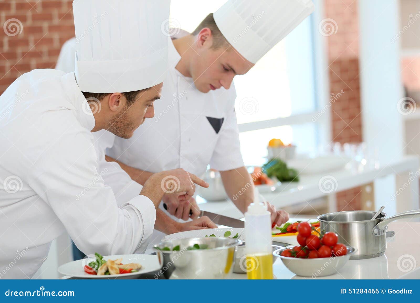 Cooking Trainees Preparing Dishes Stock Photo - Image of people ...