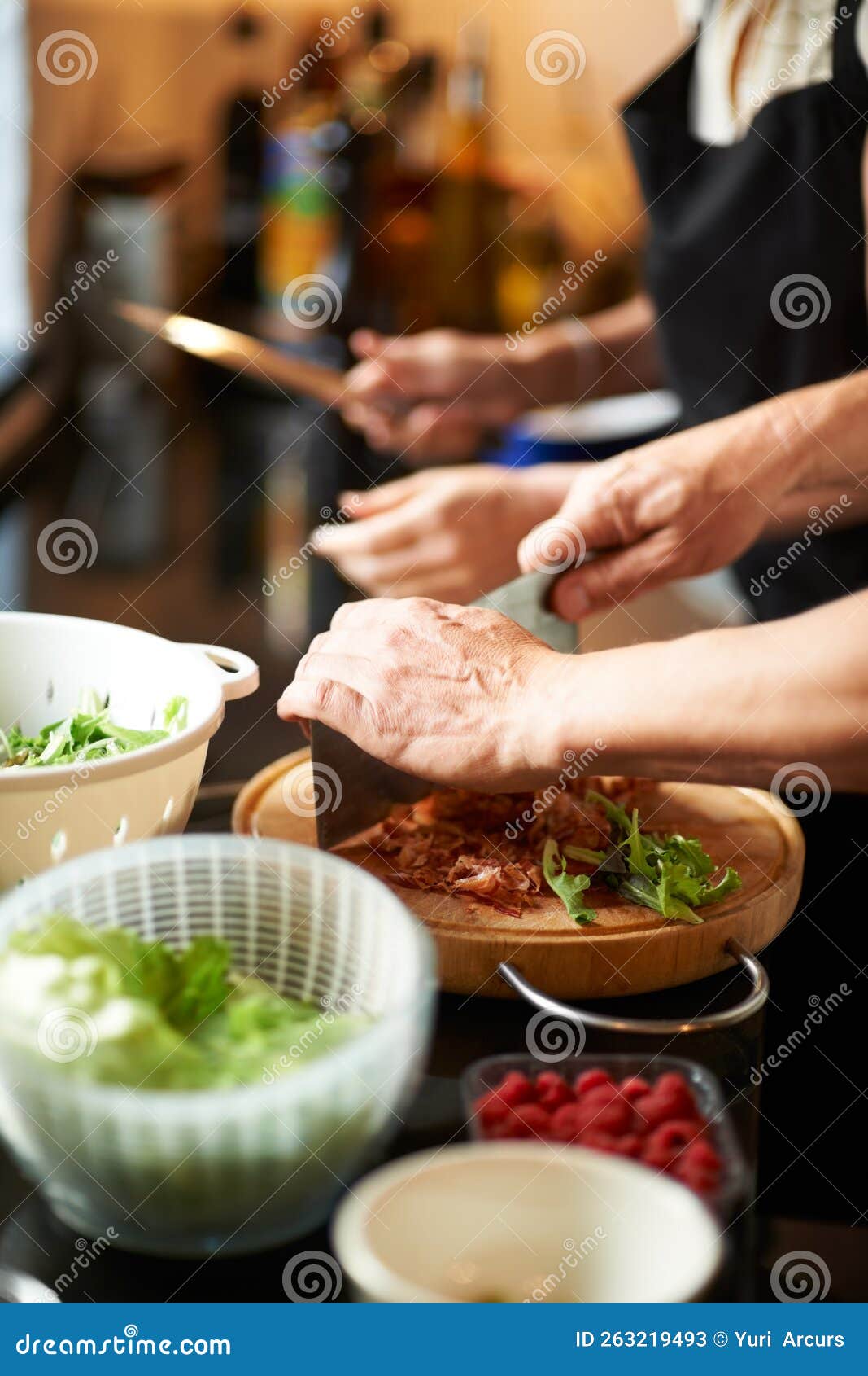 Cooking Up a Storm. a Couple Cooking in the Kitchen. Stock Image ...
