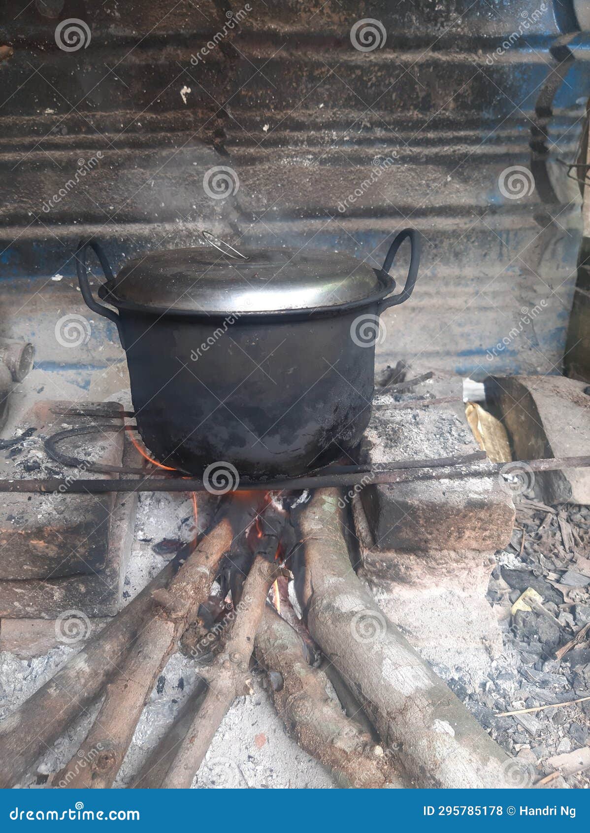 Cooking using firewood stock photo. Image of metal, glass - 295785178