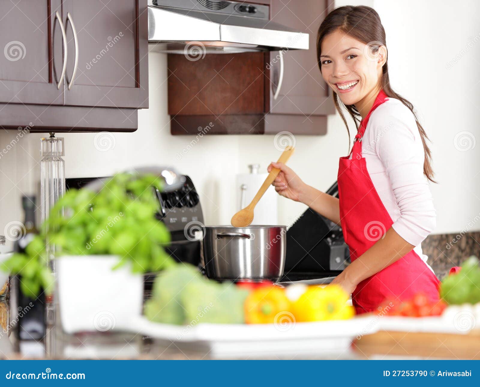 Cooking woman in kitchen stock photo. Image of house - 27253790