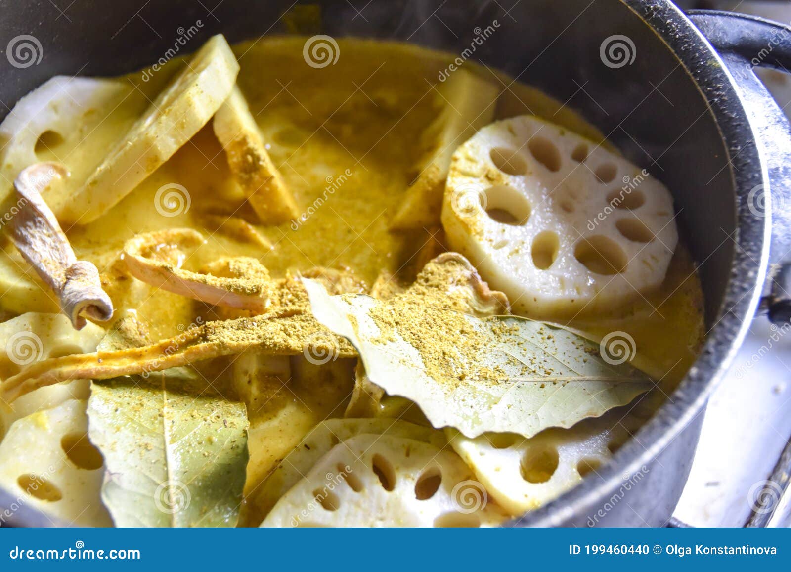 Cooking Yellow Green Curry with Lotus Root and Spices Stock Photo ...