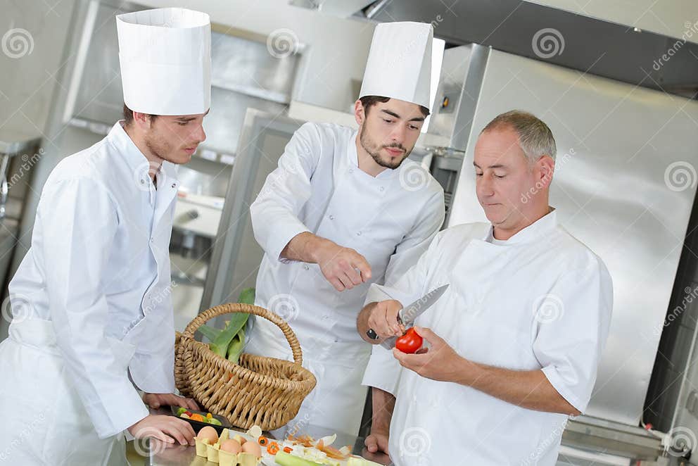 Cooks Working in Restaurant Kitchen Stock Image - Image of restaurant ...