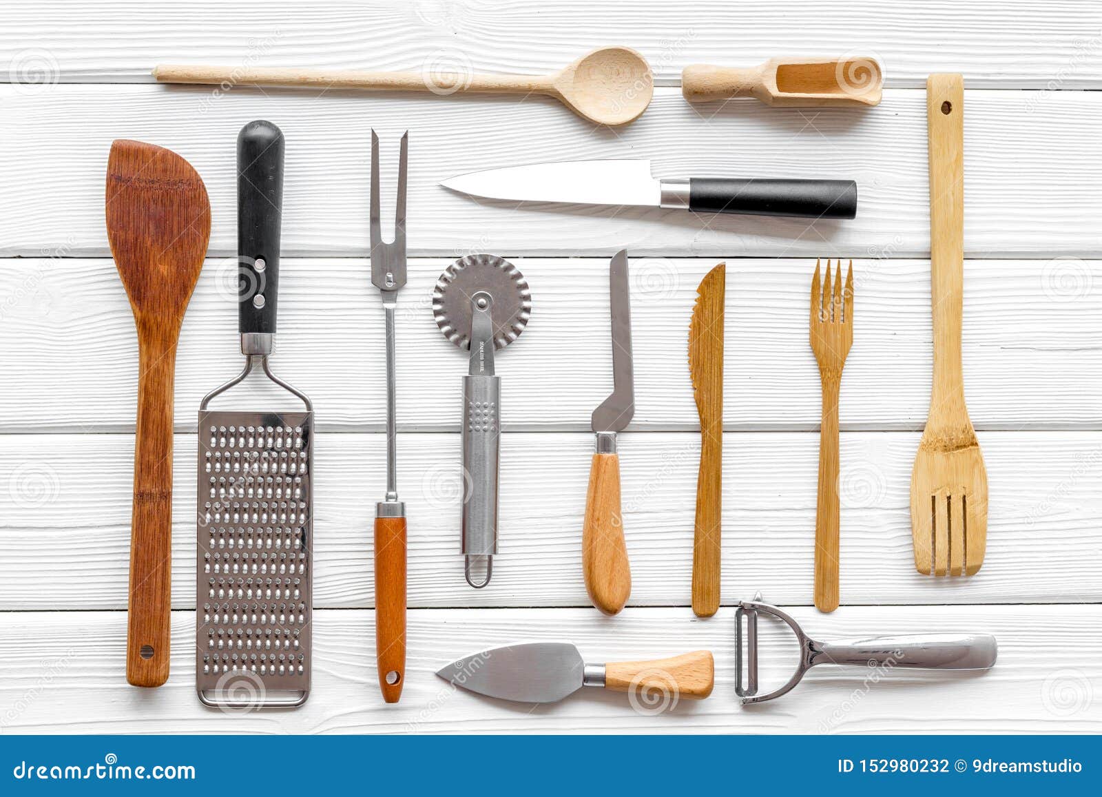 Cookware As Instruments for Cooking on White Wooden Background Top View ...