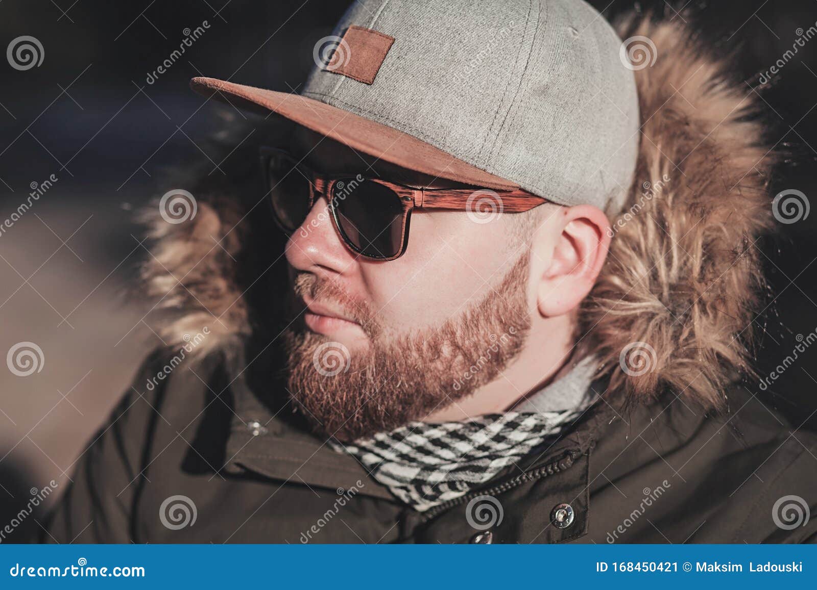 Cool bearded man in cap stock image. Image of fashionable - 168450421