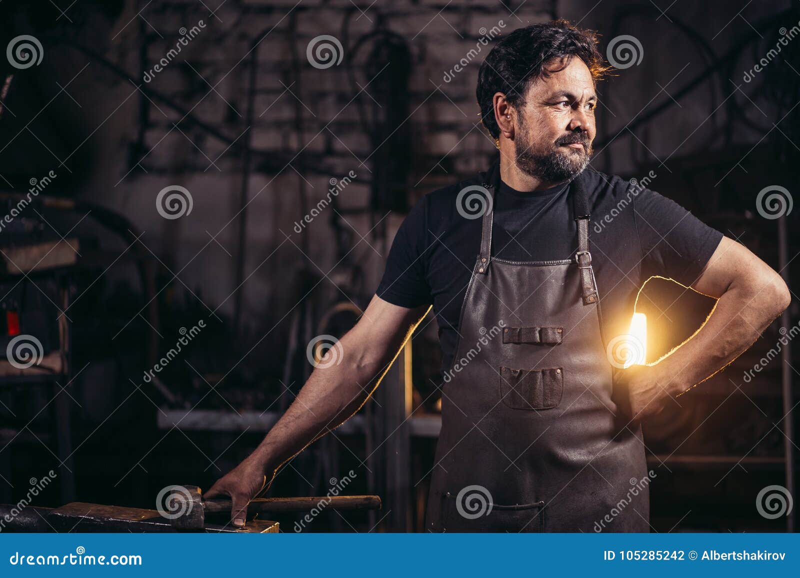 Beard Man Blacksmith Forging An Knife With Circular Saw Royalty-Free ...