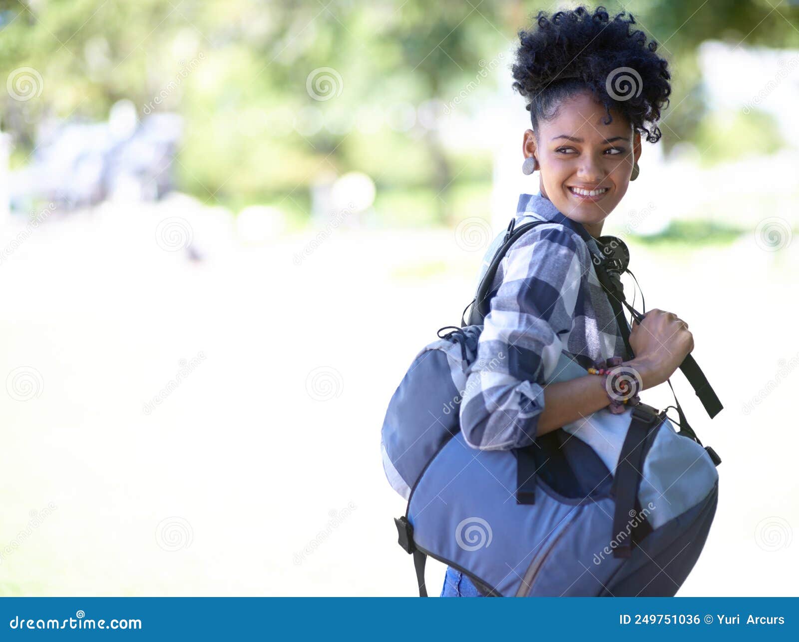 Cool and Casual on Campus. an Attractive Young College Student Standing ...